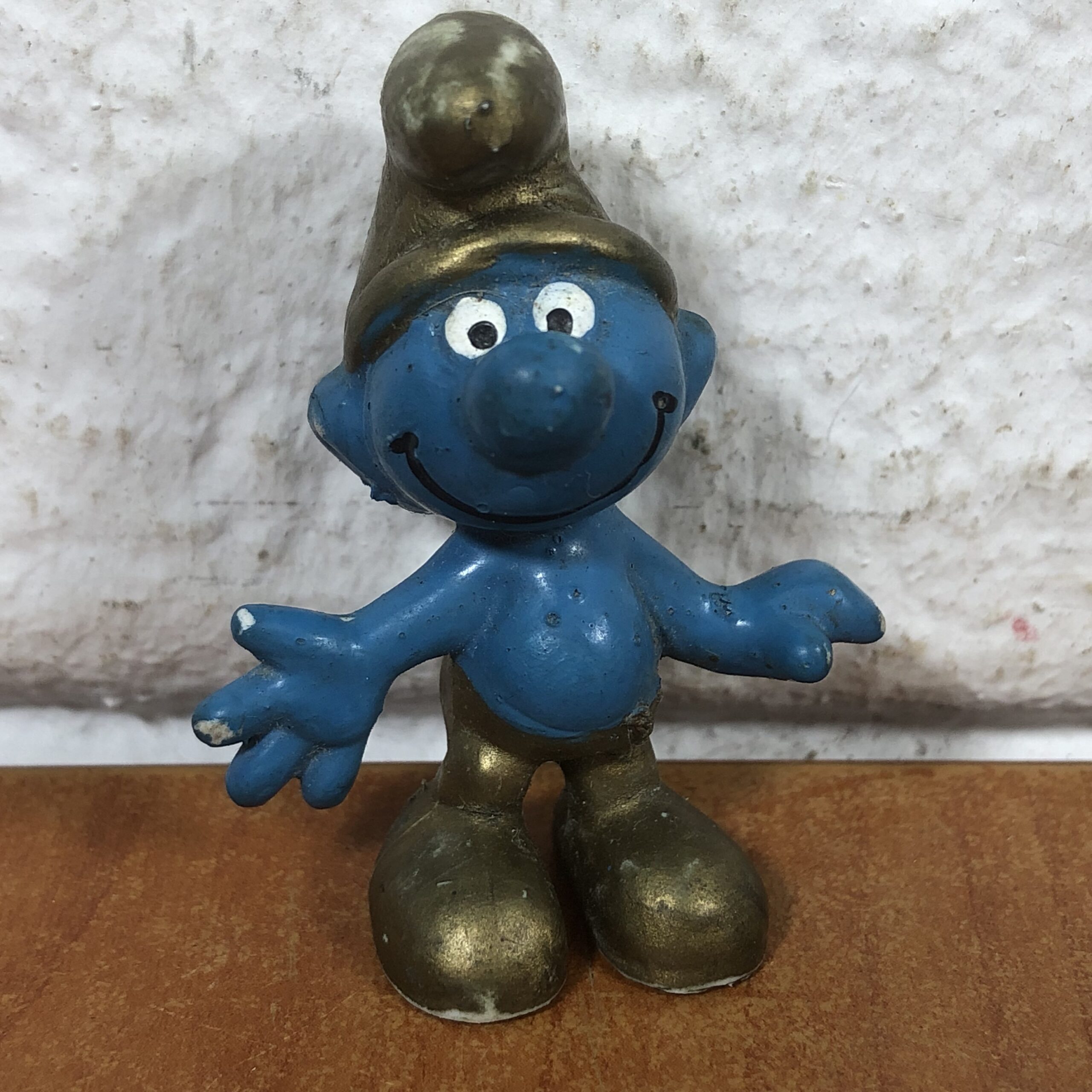 Vintage Gold Smurf Figurine - AuctionGiant