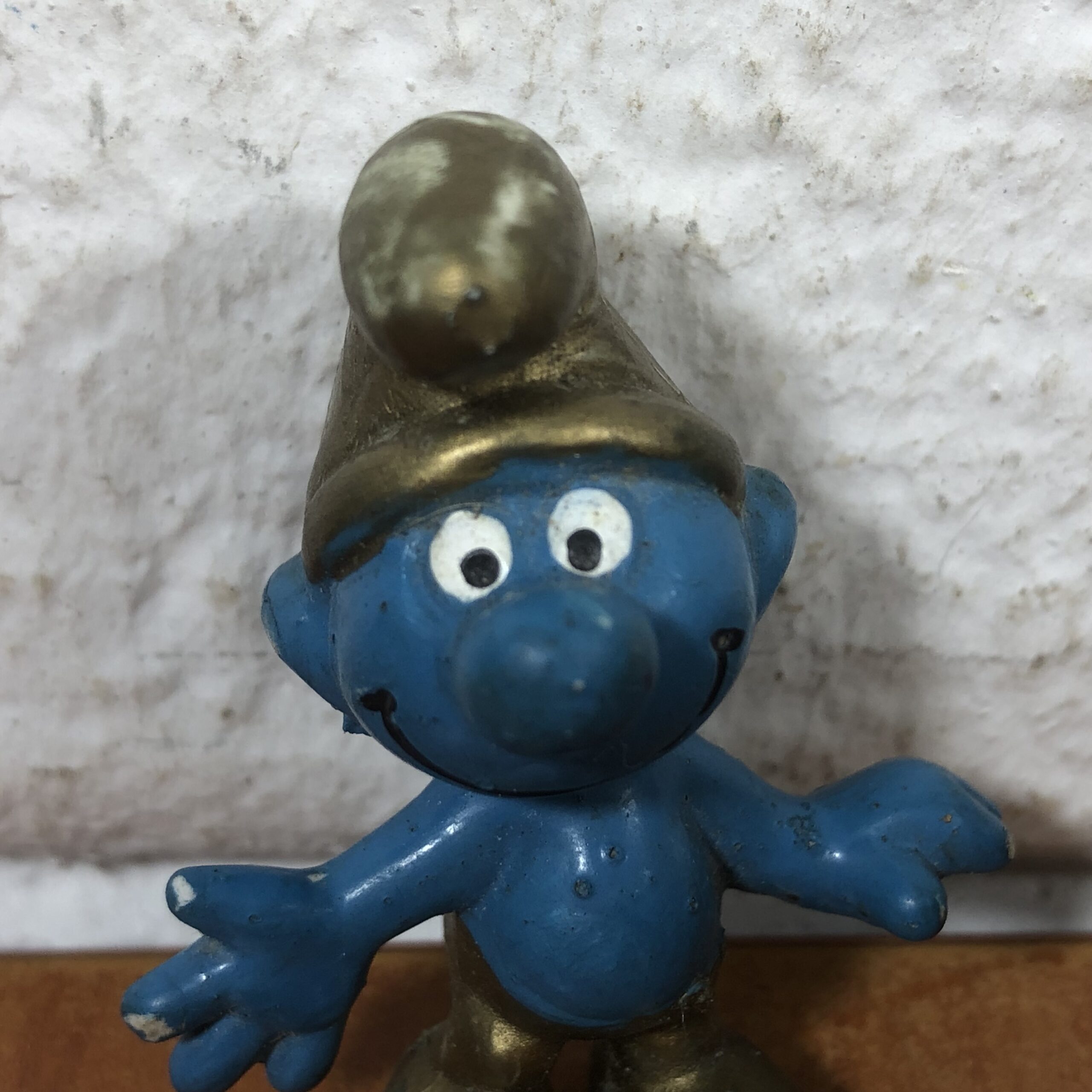 Vintage Gold Smurf Figurine - AuctionGiant