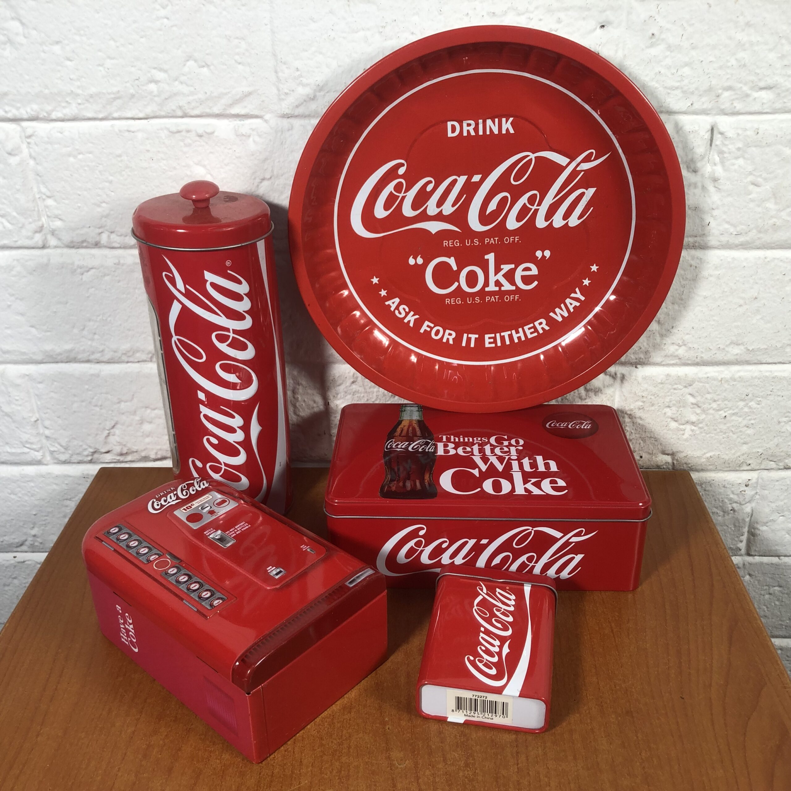 Lot 77: Coca Cola Tin Collection - AuctionGiant