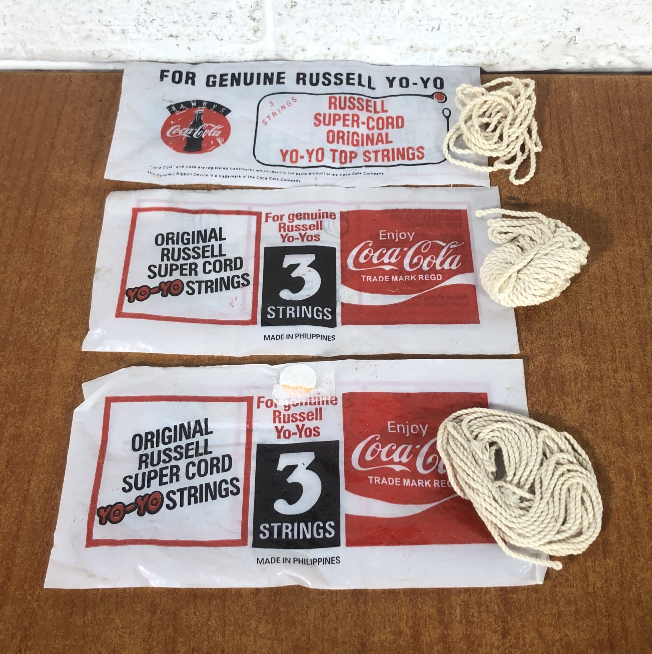 Coca Cola Genuine Russell Yo-Yo Strings in Original Packets - AuctionGiant